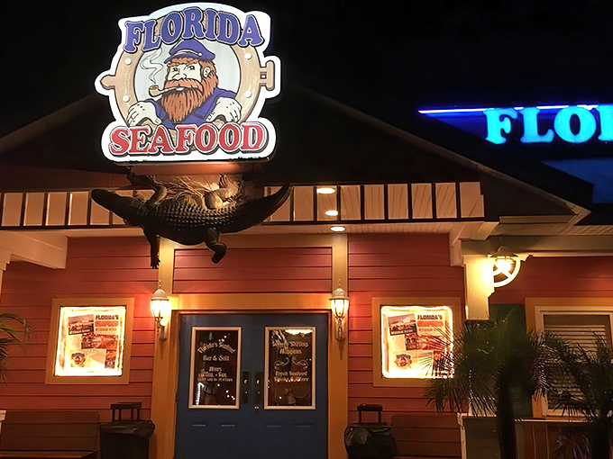 The coral-colored beacon of Florida's Seafood Bar & Grill, where that alligator isn't the greeter—he's just hanging around waiting for the seafood rejects.
