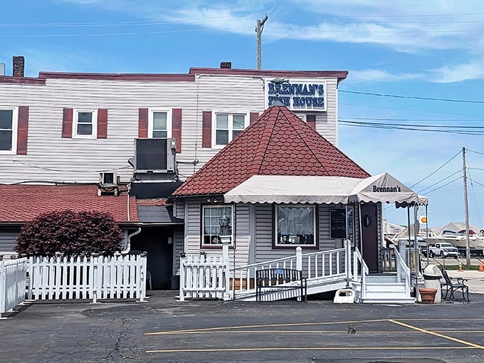 The white picket fence isn't just charming decor—it's holding back the crowds who've caught wind of Grand River's seafood sanctuary.
