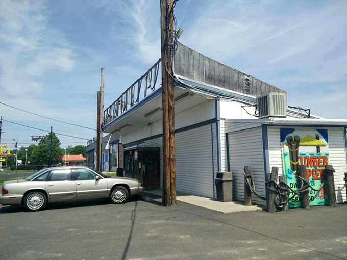 The unassuming exterior of Under the Pier might make you drive past, but locals know better. Seafood paradise hides behind that modest façade.