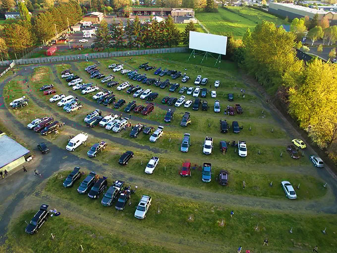 From above, the 99W Drive-In resembles a living museum of Americana—cars arranged in perfect rows facing that iconic white screen, waiting for dusk's cinematic magic.