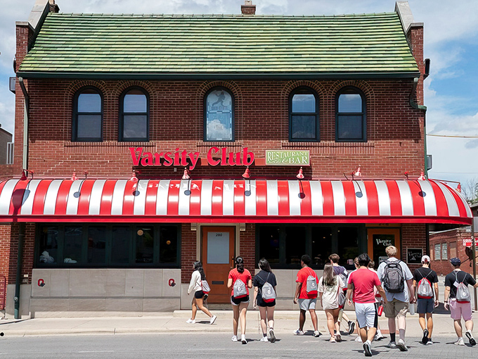 That iconic red and white awning isn't just a canopy—it's a beacon calling hungry Buckeye fans home. A Columbus landmark that promises good times inside.