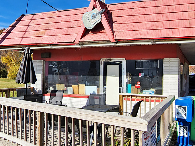 With its red roof, front porch seating, and a guitar perched proudly above the door, this humble diner on Indy’s east side feels like a step back in time—full of character and classic charm.