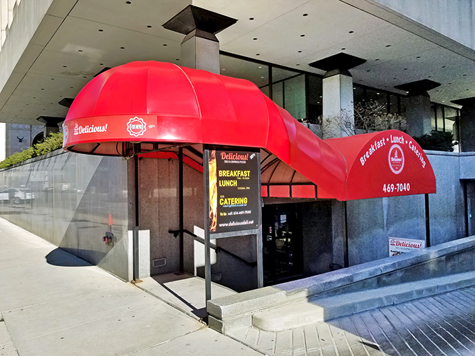 That red awning beckons like a beacon of breakfast bliss in downtown Columbus.