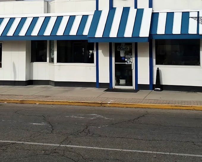 That blue and white awning isn't just decoration—it's a beacon of hope for hungry travelers on Ohio's backroads.