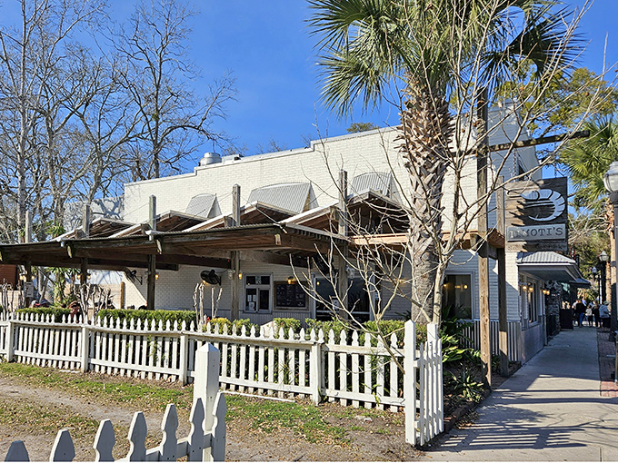 The charming white exterior of Timoti's, with its picket fence and leafy surroundings, looks like the seafood equivalent of grandma's house—if grandma were a world-class fishmonger.