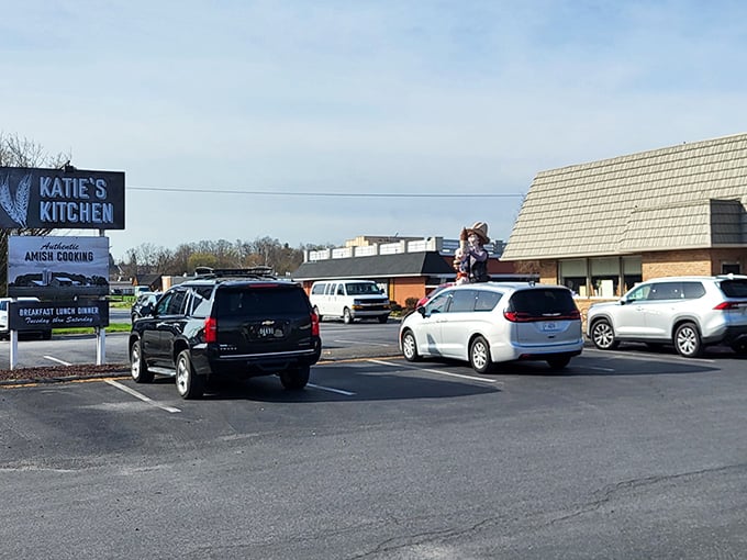 The distinctive mansard roof of Katie's Kitchen stands like a culinary lighthouse in Amish Country, beckoning hungry travelers with promises of comfort food perfection.