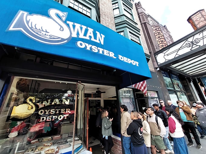 The iconic blue awning of Swan Oyster Depot – San Francisco's seafood institution where time stands deliciously still on Polk Street.