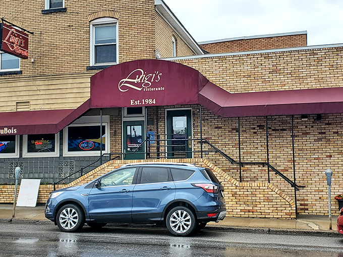The unassuming brick exterior of Luigi's in Clymer might not scream "culinary destination," but that red awning is practically a beacon for those in the know.