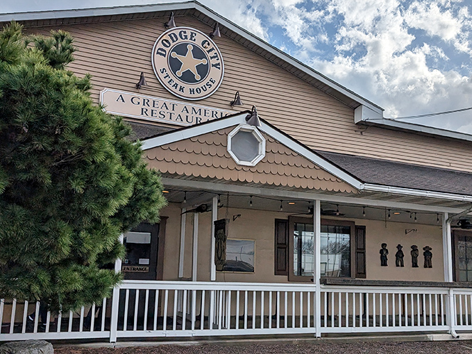 The Western-themed façade of Dodge City Steakhouse promises a culinary adventure that lives up to its "Great American Restaurant" billing.