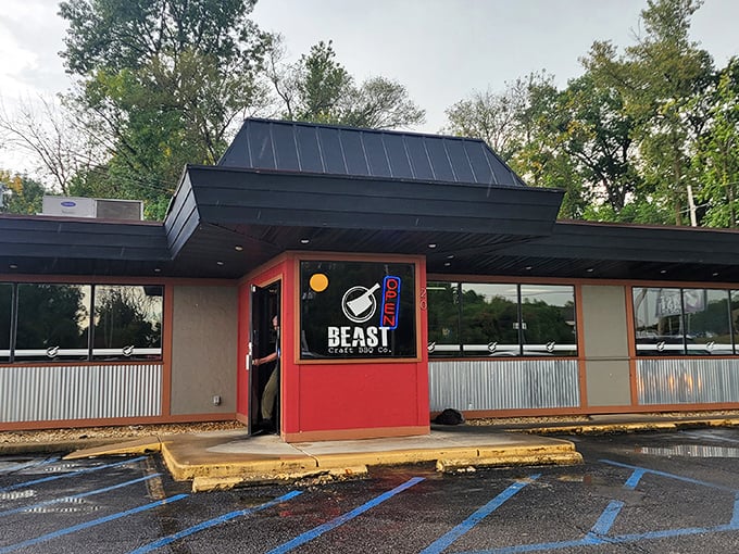 The unassuming exterior hides barbecue greatness like Clark Kent's glasses hide Superman. Red accents hint at the flavor explosions waiting inside.