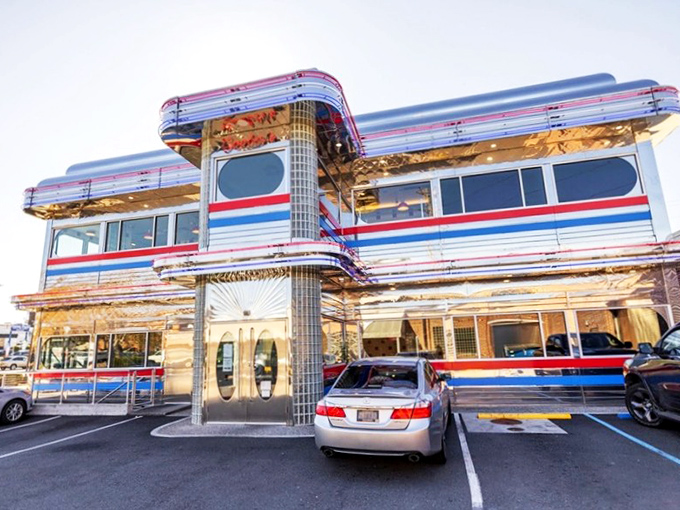 The gleaming chrome exterior of Goobers Diner shines like a beacon of nostalgia, promising a time-traveling culinary adventure inside.