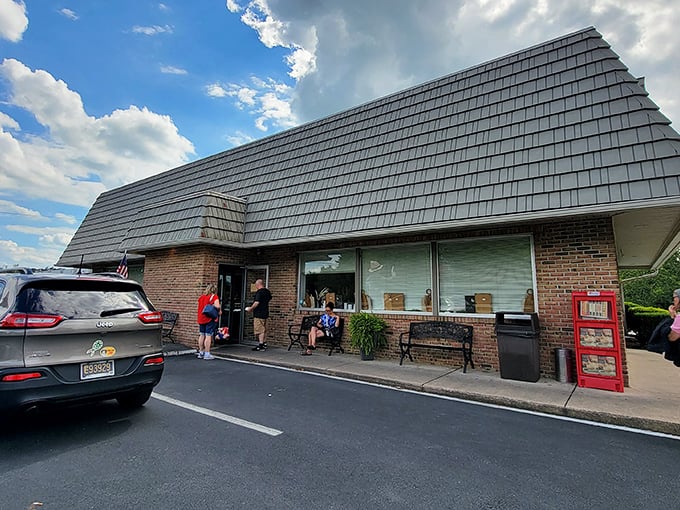 The humble brick exterior of Katie's Kitchen hides culinary treasures inside, like finding a pearl in an unassuming oyster. That Amish figure seems to say, "You're in for something special."