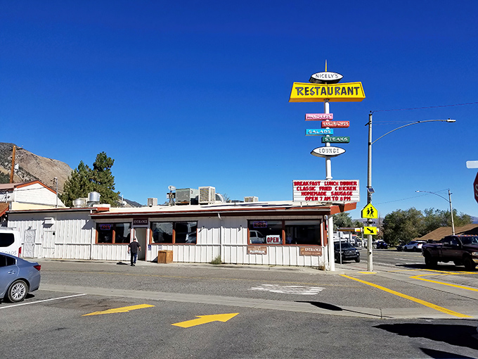 The classic roadside beacon that is Nicely's Restaurant stands proudly against the Eastern Sierra backdrop, promising comfort and satisfaction to weary travelers.