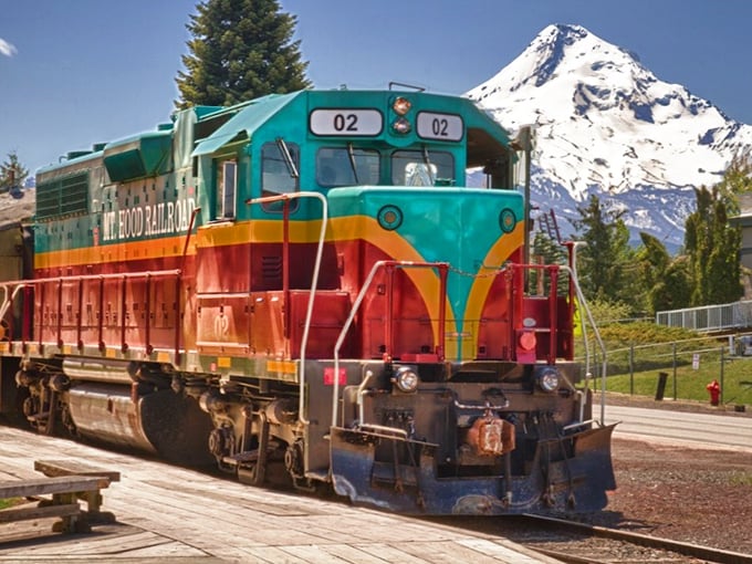 That's not just any locomotive – it's a rolling piece of Americana with Mount Hood providing the perfect backdrop.
