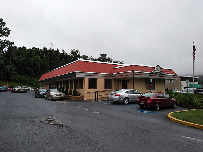 The classic red-roofed exterior with its proudly waving American flag promises comfort food nirvana before you even step inside.