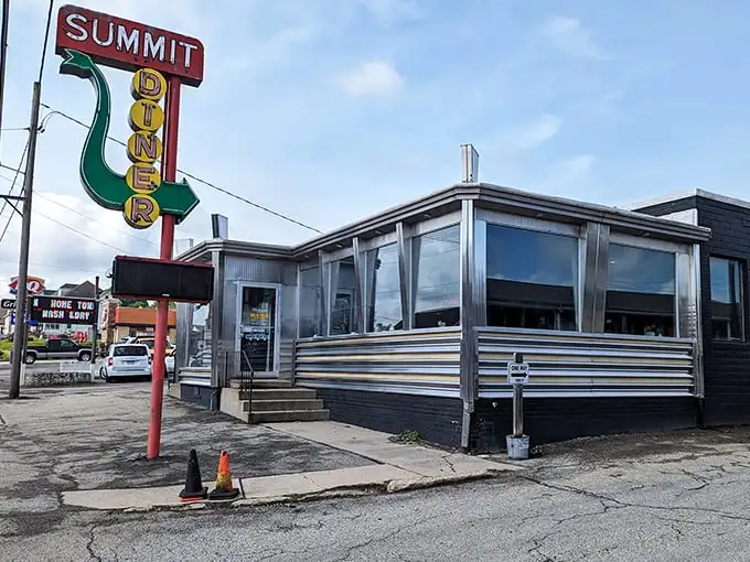 The gleaming stainless steel exterior of Summit Diner stands as a time capsule on wheels, promising comfort food and conversations that matter.