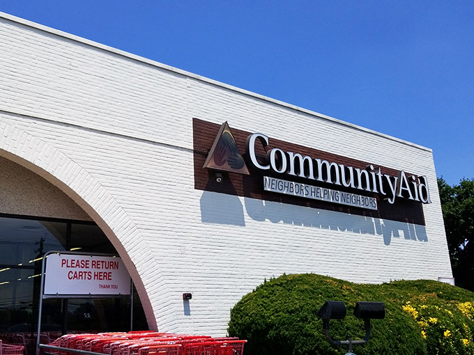 The unassuming exterior of CommunityAid belies the treasure trove within—like finding a gourmet meal at what looks like a roadside diner.