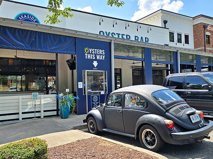 The crisp white exterior with navy blue accents makes Seaside Oyster Bar look like it teleported straight from a New England coast to suburban Suwanee.