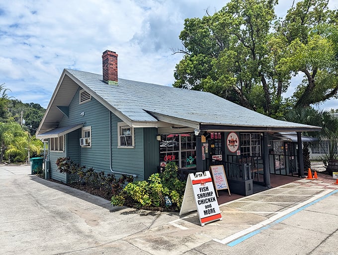 The unassuming green exterior of Tony's Clam Chowder hides culinary treasures within, like finding a pearl in an oyster shell.