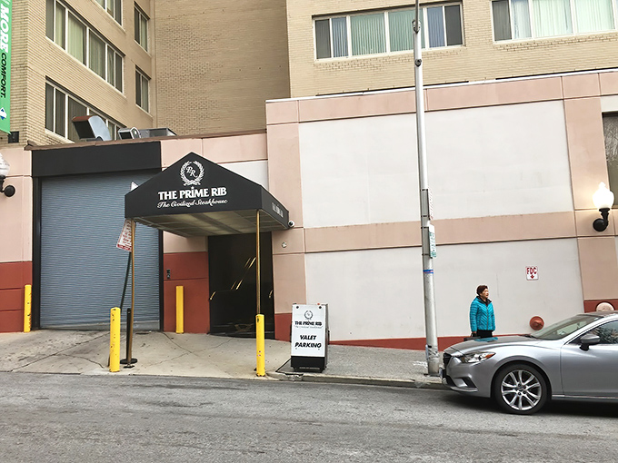 The unassuming entrance belies the culinary magic within—like finding out your quiet neighbor secretly moonlights as a magician specializing in beef-based illusions.