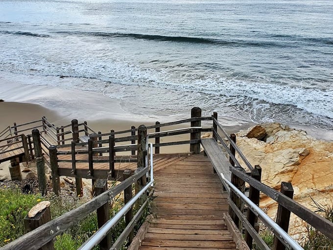 The wooden staircase at El Capitán beckons like a portal to paradise. Each step brings you closer to that perfect blend of sand, sea, and serenity.