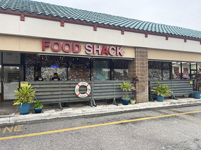 The unassuming strip mall exterior of Food Shack proves once again that culinary treasures often hide in plain sight.