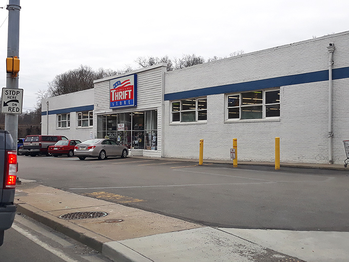 The unassuming exterior of Red White and Blue Thrift Store on Saw Mill Run Boulevard hides a treasure trove that makes bargain hunters' hearts race with anticipation.