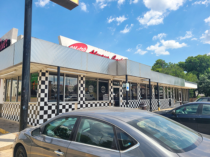 The classic black-and-white checkered exterior isn't trying to impress Instagram – it's been too busy serving perfect breakfasts for decades.
