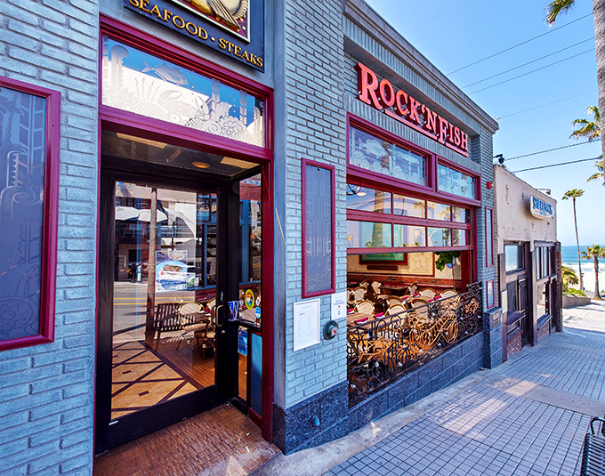 The iconic blue exterior with bold red trim makes Rock'N Fish impossible to miss, like a maritime flag signaling "delicious food ahead" to hungry Manhattan Beach explorers.