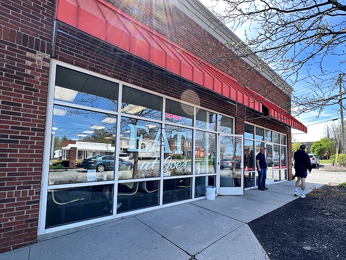 The iconic red awning of Eat at Joe's beckons like a lighthouse for hungry souls navigating the streets of South Euclid.