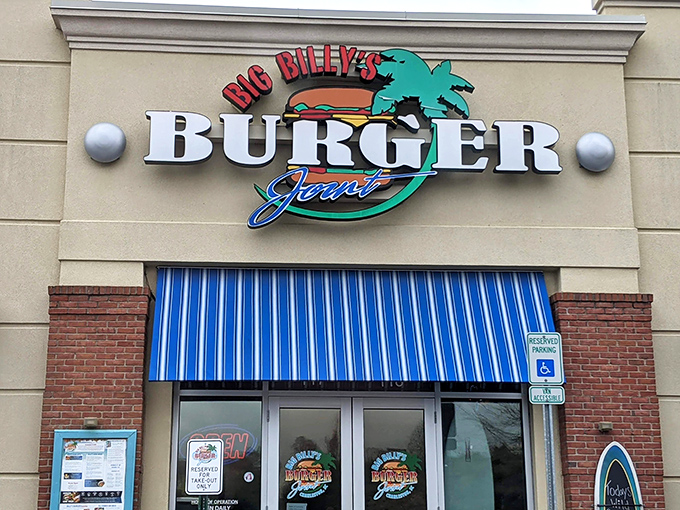 The beacon of burger bliss! Big Billy's vibrant sign and blue awning promises coastal flavors and comfort food that'll make your taste buds dance.