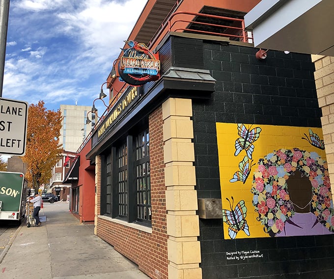 That red neon glow isn't just a sign—it's a beacon calling to burger pilgrims across Madison. The humble brick exterior belies the flavor explosion waiting inside.
