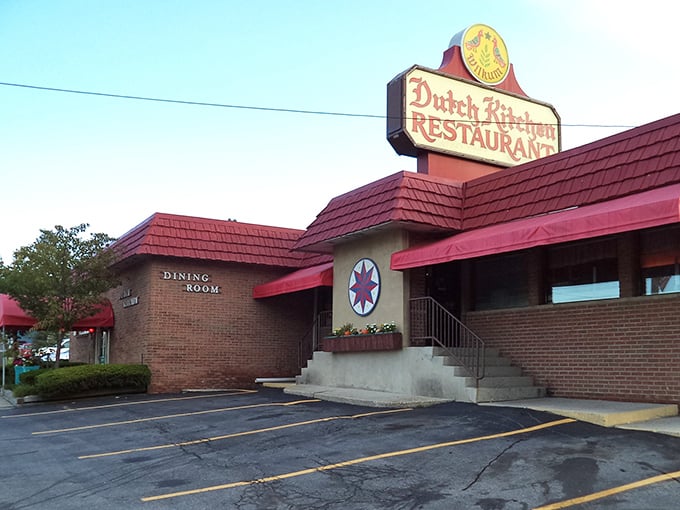 The iconic red-roofed Dutch Kitchen stands like a beacon of comfort food salvation along Route 61, promising Pennsylvania Dutch delights within those brick walls.
