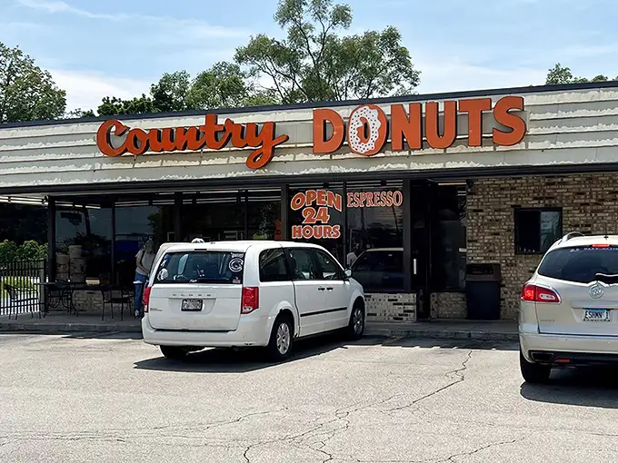 That orange signage isn't just advertising – it's a beacon calling donut lovers home to paradise.