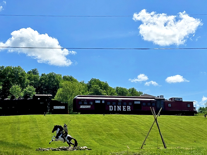 The scarlet train car stands like a time machine disguised as a diner—permanently parked but ready to transport your taste buds somewhere delicious.