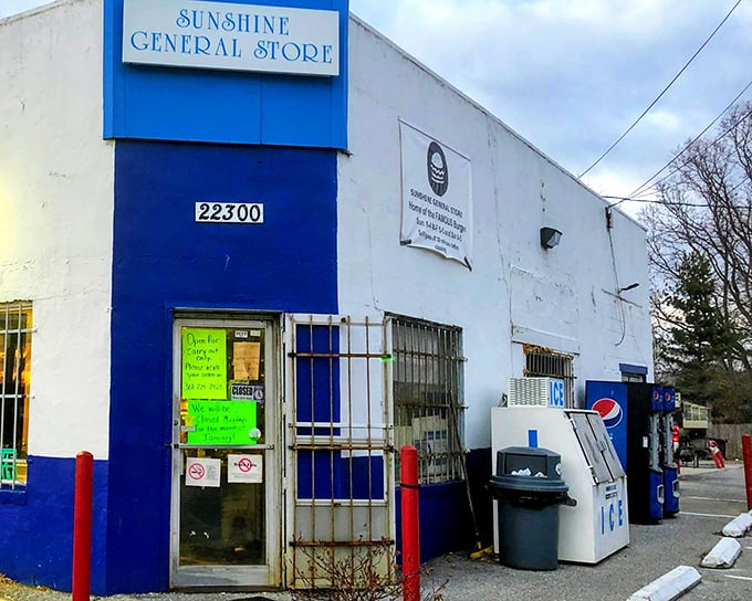 The blue and white exterior of Sunshine General Store stands as an unassuming temple of burger greatness in Brookeville. No fancy frills, just culinary thrills await inside.