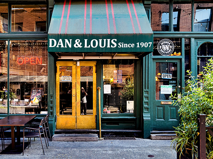 The iconic green awning and yellow doors of Dan & Louis Oyster Bar stand as a beacon for seafood lovers in downtown Portland. Maritime tradition meets urban charm.