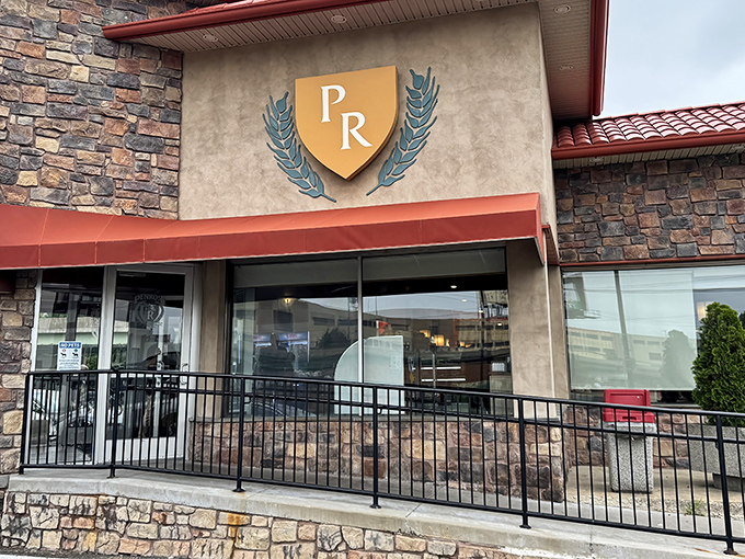 The iconic PR shield welcomes hungry pilgrims to this temple of comfort food. Stone façade says "established institution," but the food inside screams "come back tomorrow!"