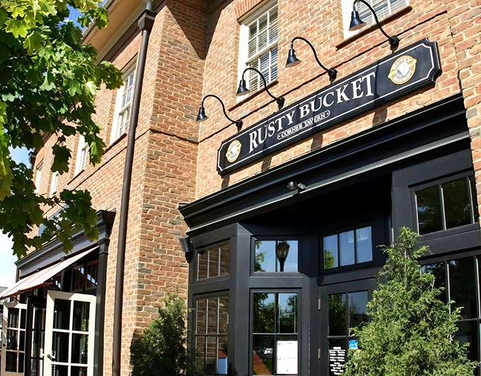 The brick façade and black trim of Rusty Bucket's New Albany location feels like that perfect neighborhood spot you'd hate to share but can't help bragging about.