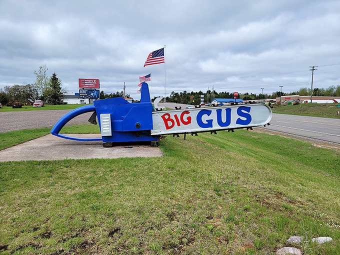 Big Gus, the world's largest chainsaw, greets visitors like an overeager blue puppy – if puppies could slice through redwoods and weighed 123 tons.