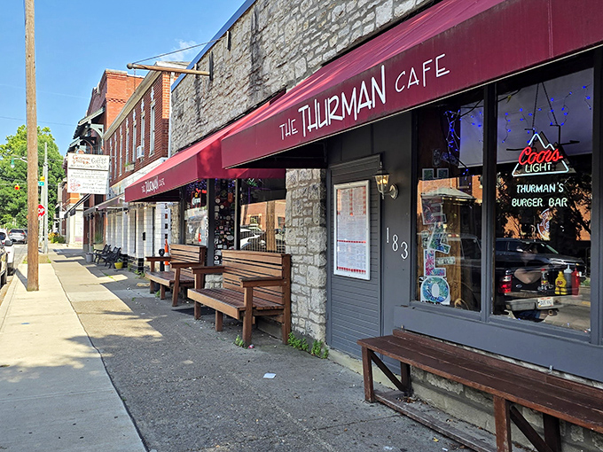The unassuming stone exterior of The Thurman Cafe hides Columbus' most legendary burger joint. Those wooden benches aren't decorative—they're survival gear for the inevitable wait.