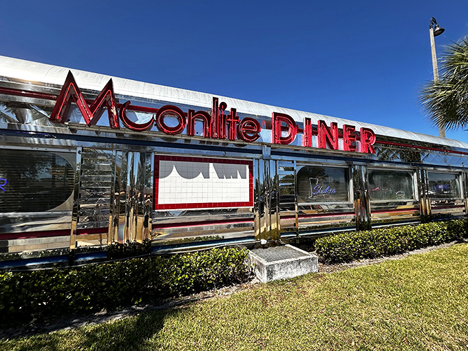 Chrome gleaming in the Florida sunshine, Moonlite Diner's exterior promises a time-traveling feast. This isn't just a restaurant—it's a shiny portal to simpler times.