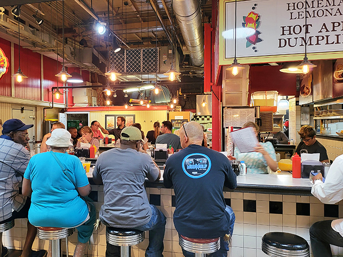 The iconic Dutch Eating Place sign promises culinary treasures within Reading Terminal Market. Those colorful hearts aren't just decoration—they're a preview of the heartfelt cooking awaiting you.