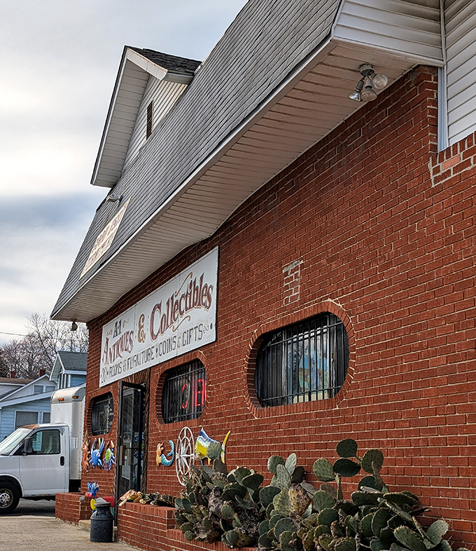 The brick façade of A-1 Antiques beckons with colorful marine-themed art and the promise of "20 ROOMS" – like a treasure map where X marks every spot.