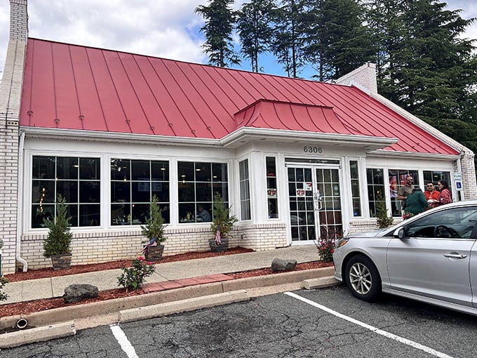 The iconic red roof of Barnside Diner beckons hungry travelers like a lighthouse guiding ships to breakfast harbor. Classic Americana at its finest.