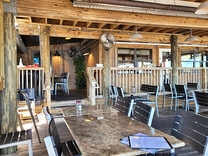 Rustic wooden beams and salt-kissed pillars aren't designer touches—they're the real deal at this dockside haven where authenticity isn't manufactured, it's marinated. 