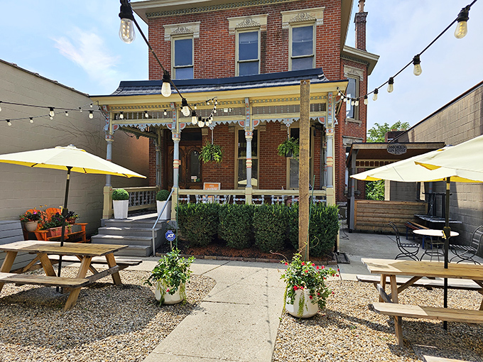 Victorian charm meets barbecue brilliance at this red brick beauty. String lights and picnic tables create the perfect setting for meat-fueled memories.