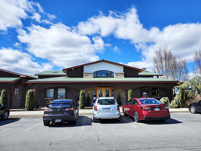The stone-and-wood exterior of Traditions welcomes hungry travelers like a cozy sweater on a chilly Pennsylvania morning.