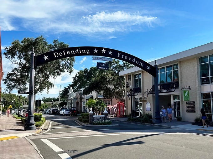 The iconic "Defending Freedom" arch welcomes visitors to downtown Dunedin, where small-town charm meets Florida sunshine in perfect harmony.