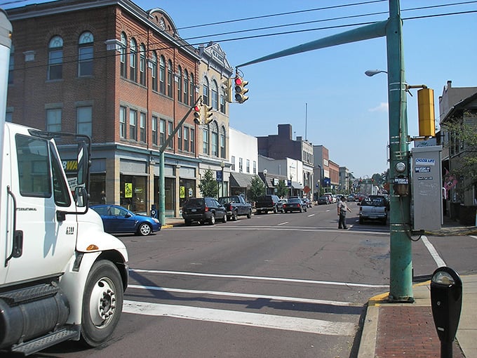 Market Street stretches before you like a small-town time capsule, where brick buildings tell stories and traffic lights are more suggestion than necessity.